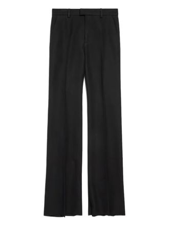 Balenciaga pantalon &eacute;vas&eacute; &agrave; d&eacute;tails pliss&eacute;s - Noir