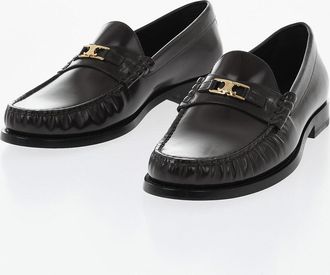 Celine Mokassins aus Leder mit Monogramm in Goldoptik Celine