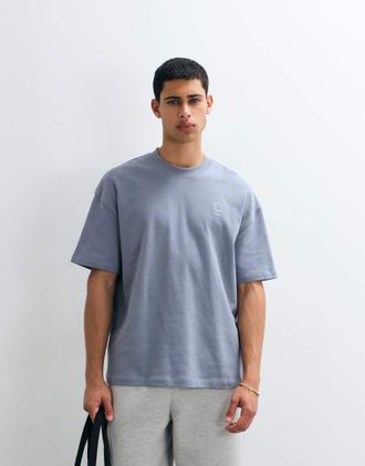 AllSaints Haven - T-Shirt in Dunkelblau mit kleiner Logo-Stickerei auf der Brust