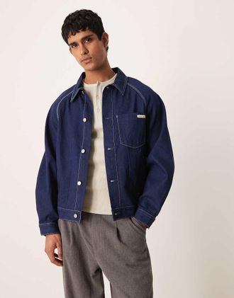 Calvin Klein Jeans Veste de travail &agrave; surpiq&ucirc;res et coutures contrastantes - Bleu moyen