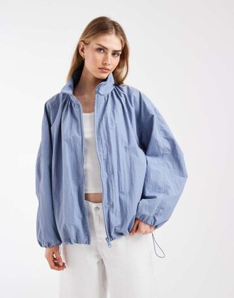 Asos Veste de surv&ecirc;tement oversize &agrave; ourlet bouffant - Bleu-Neutre