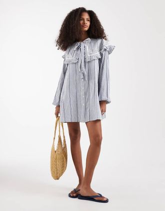 Neon Rose Robe babydoll ray&eacute;e &agrave; manches longues et bords volant&eacute;s - Bleu