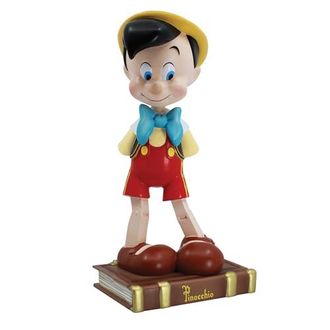 Enesco Disney Showcase Pinocchio Stehend auf Geschichtenbuch, 85. Jahrestag, Figur, 22,9 cm, Mehrfarbig