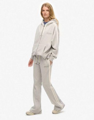 Superdry Athletic - Pantalon de jogging &eacute;vas&eacute; &agrave; rayures - Gris chin&eacute;