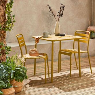 Sweeek Table de jardin m&eacute;tal + 2 assises ocre Am&eacute;lia