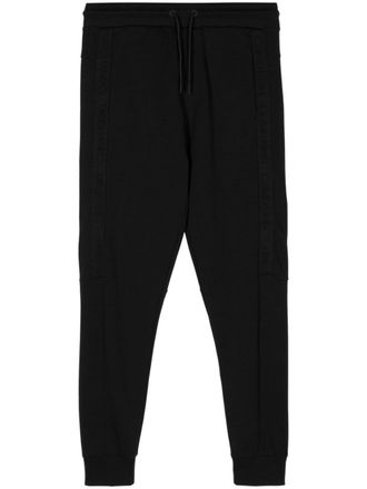 Calvin Klein pantalon de jogging &agrave; bande logo - Noir