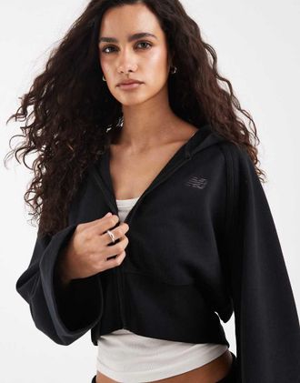 New Balance Kapuzenpullover aus geb&uuml;rstetem Coastal-Fleece mit durchgehendem Rei&szlig;verschluss in Schwarz