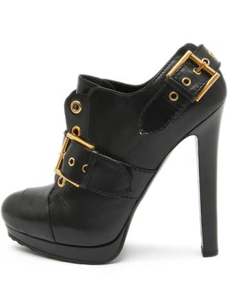 Alexander McQueen bottines &agrave; d&eacute;tails doeillets 145 mm - Noir