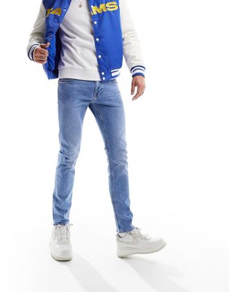 Lee Luke - Schmal zulaufende Jeans in heller Worker-Worn-Waschung mit schmalem Schnitt-Blau