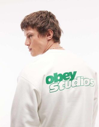 Obey Tonic - Sweatshirt in Wollwei&szlig; mit Logo, Rundhalsausschnitt und R&uuml;ckenprint