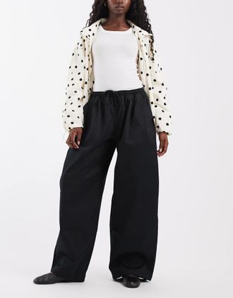 Nike Street Utility gewebte Oversize-Hose in Schwarz