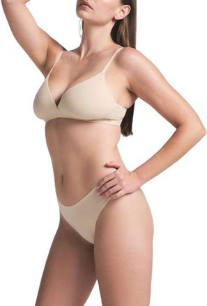 SKIMS Culotte mi-haute unie sans coutures