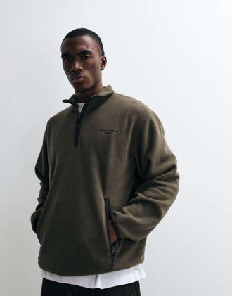 Carhartt Work in Progress Edmore Fleece-Sweatshirt mit halbem Rei&szlig;verschluss in Khaki-Gr&uuml;n