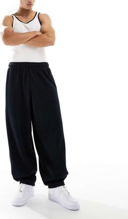 Nike Club - Pantalon de jogging oversize en tissu éponge - Noir