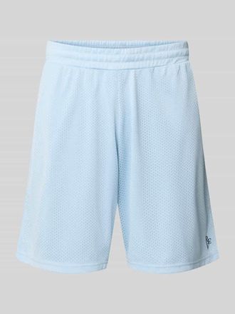 Review Shorts aus Mesh mit Logo-Print