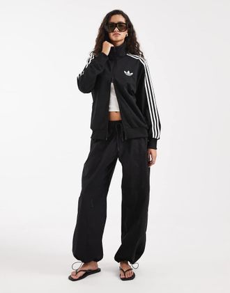 adidas Originals Firebird - Veste de surv&ecirc;tement ample - Noir et blanc