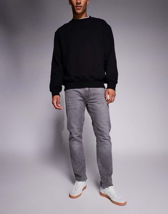 Levi's 502 - Schmal zulaufende Jeans in grauer Waschung