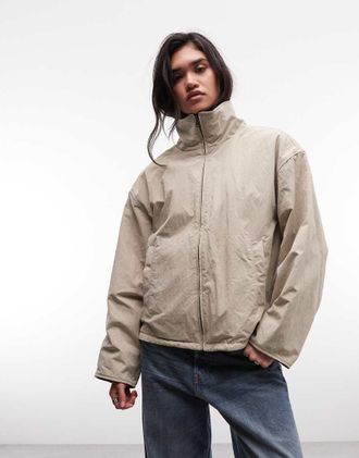 Weekday veste de surv&ecirc;tement &agrave; col montant avec doublure en imitation peau de mouton beige-Neutre