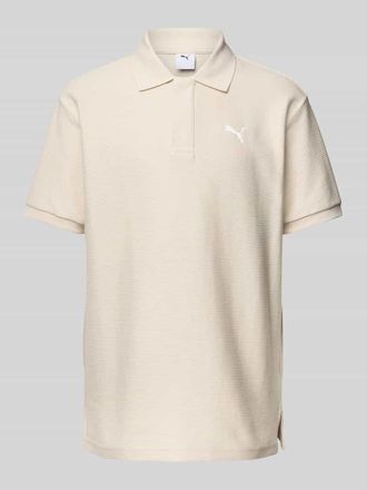 Puma Relaxed Fit Poloshirt mit Label-Stitching