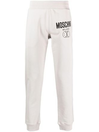 Moschino pantalon de jogging &agrave; logo imprim&eacute; - Gris
