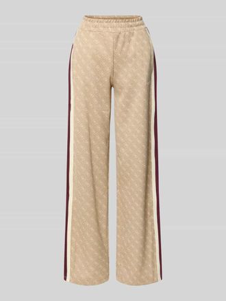 Guess Wide Fit Sweatpants mit Allover-Logo-Print Modell Jacquard