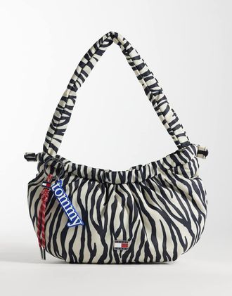 Tommy Jeans Schultertasche mit Zebramuster und Markenlogo-Anh&auml;nger-Bunt