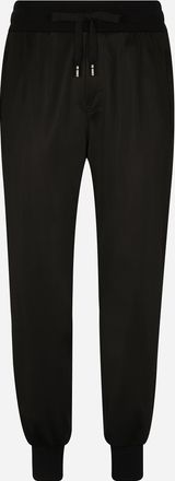 Dolce & Gabbana Jogginghose Aus Funktionsjersey Mit Plakette - Mann Hosen Und Shorts Schwarz Stoff 46