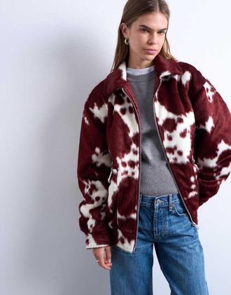 Topshop Bomber en fausse fourrure &agrave; imprim&eacute; vache-Rouge