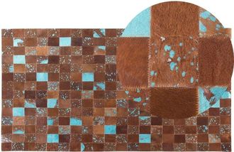 Beliani Beliani - Tapis Patchwork 80 x 150 cm en Peau de Vache Marron et Bleu Fait à la Main Aliaga