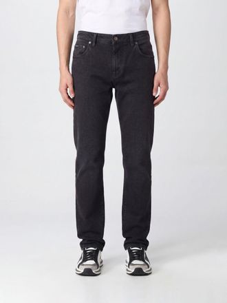 Dolce & Gabbana Jean slim en denim stretch avec plaque logo au dos