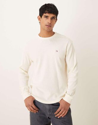Calvin Klein Jeans t-shirt &agrave; manches longues en maille gaufr&eacute;e &eacute;cru-Blanc