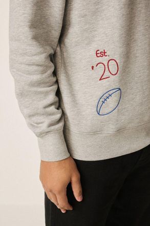 Next Sweater Lizenziertes Sweatshirt mit 1/4-RV und Grafik, NFL (1-tlg)