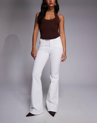 Good American Good Legs - Jean &eacute;vas&eacute; &agrave; taille haute - Blanc