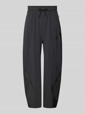 adidas Oversized Jogpants mit Rei&szlig;verschlusstaschen