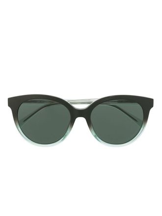 Love Moschino lunettes de soleil &agrave; monture transparente - Vert