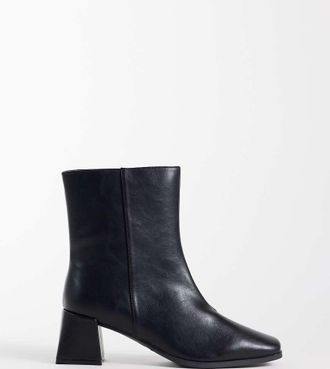 London Rebel London Rebel bottines mi-hautes Delta noires coupe large