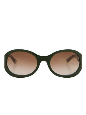 Gucci lunettes de soleil à logo gravé - Vert