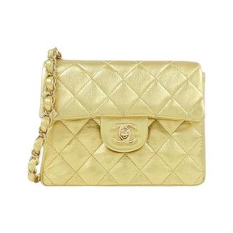 Chanel Sac d&eacute;paule matelass&eacute; en cuir dagneau m&eacute;tallis&eacute; Pre-owned - Femme - Pre-owned - Jaune - Taille: ONE Size