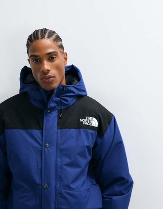 The North Face Mountain-Daunenjacke in Blau und Schwarz