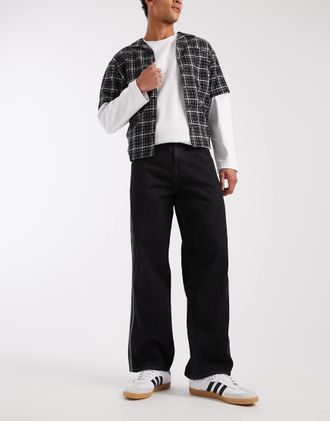 adidas Originals Firebird - Locker geschnittene Jeans in Schwarz