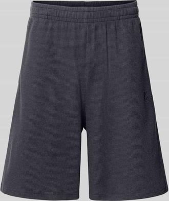 Karl Kani Relaxed Fit Shorts mit Strukturmuster