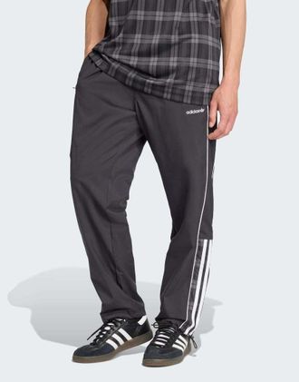 adidas Originals Pantalon de surv&ecirc;tement ample motif &eacute;cossais - Noir