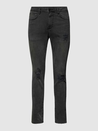 Review Skinny Fit Jeans im Used-Look