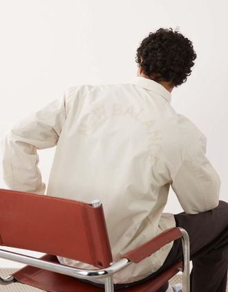 New Balance Veste dentra&icirc;neur l&eacute;g&egrave;re - Beige-Neutre