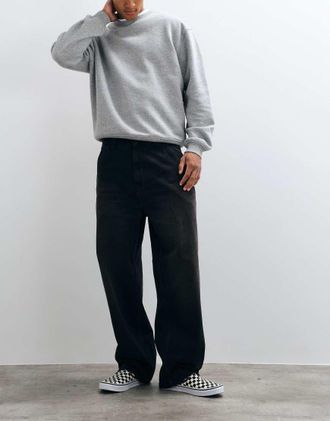 Carhartt Work in Progress jean coupe droite ample OG Single Knee d&eacute;lav&eacute; noir sale