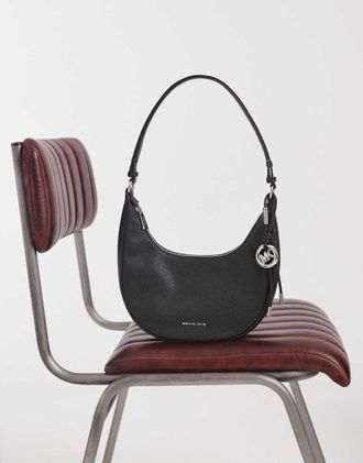 Michael Kors Nolita sac port&eacute; &eacute;paule convertible en cuir noir