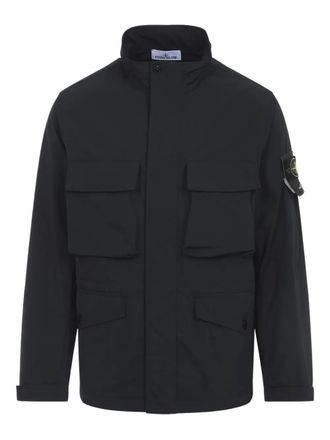 Stone Island veste &agrave; patch logo et poches &agrave; rabat - Noir