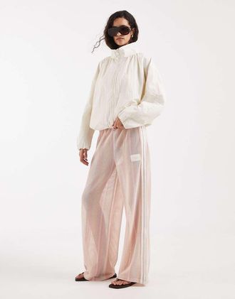 adidas Originals Firebird - Pantalon de surv&ecirc;tement en maille - Rose sable