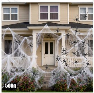 Com-Four 26-teiliges Deko-Set für Halloween - 500g dehnbares Spinnennetz mit 25 schwarzen Spinnen - gruseliges weißes Spinnengewebe als Dekoration für Hallowee