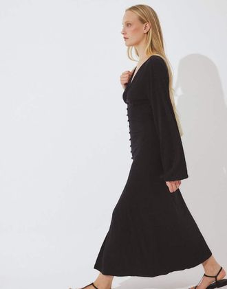 NA-KD Robe longue boutonn&eacute;e &agrave; manches bouffantes - Noir